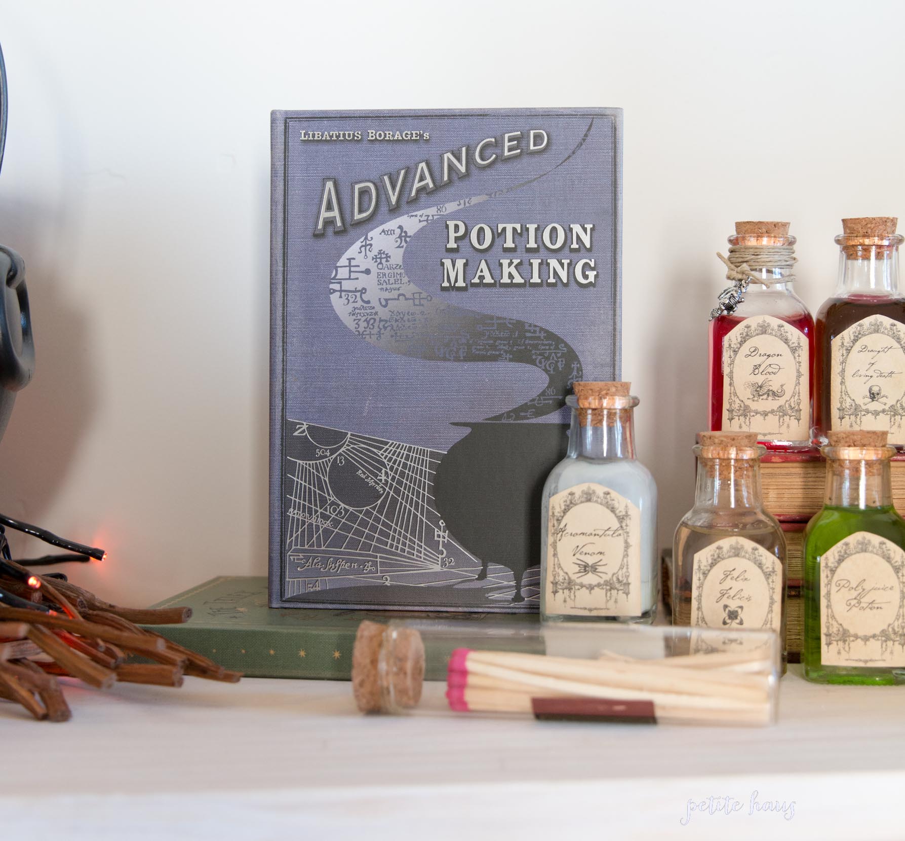Haunted Apothecary Halloween Mantle with DIY Potion Bottles - Petite Haus